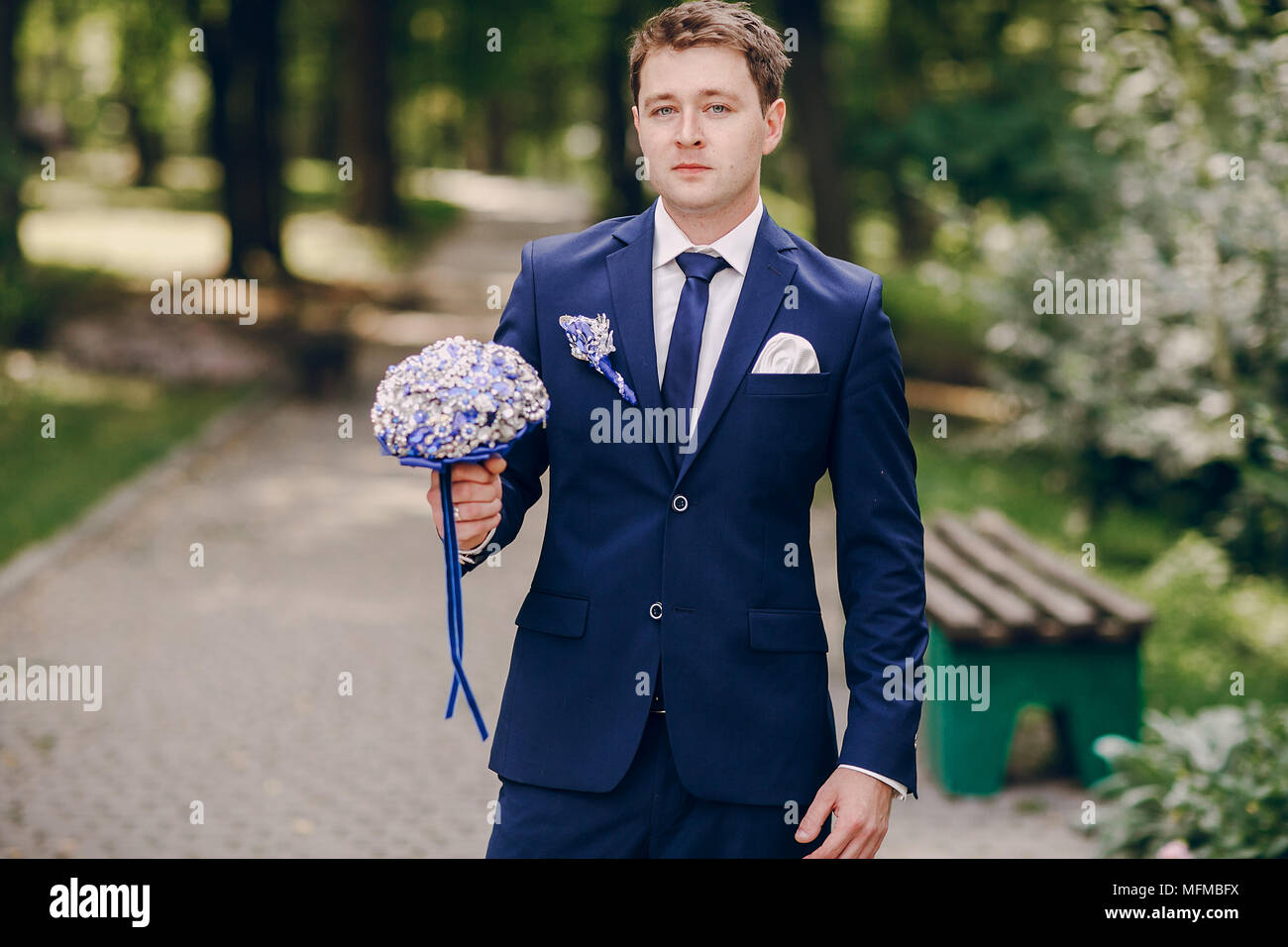 Stylish groom in blue luxury hi-res stock photography and images - Alamy