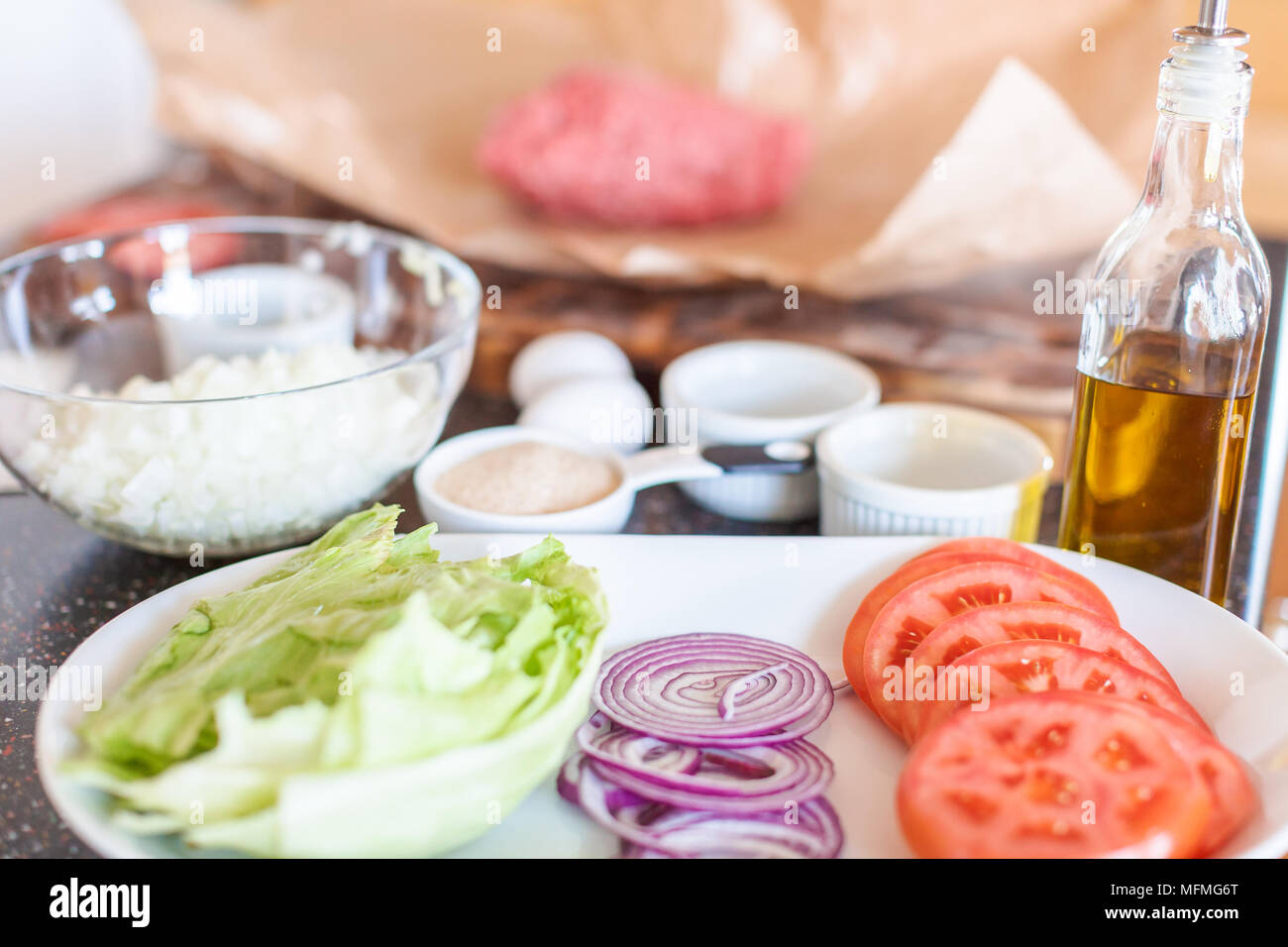 Preparing gourmet burger beef patties for classic burgers Stock Photo ...