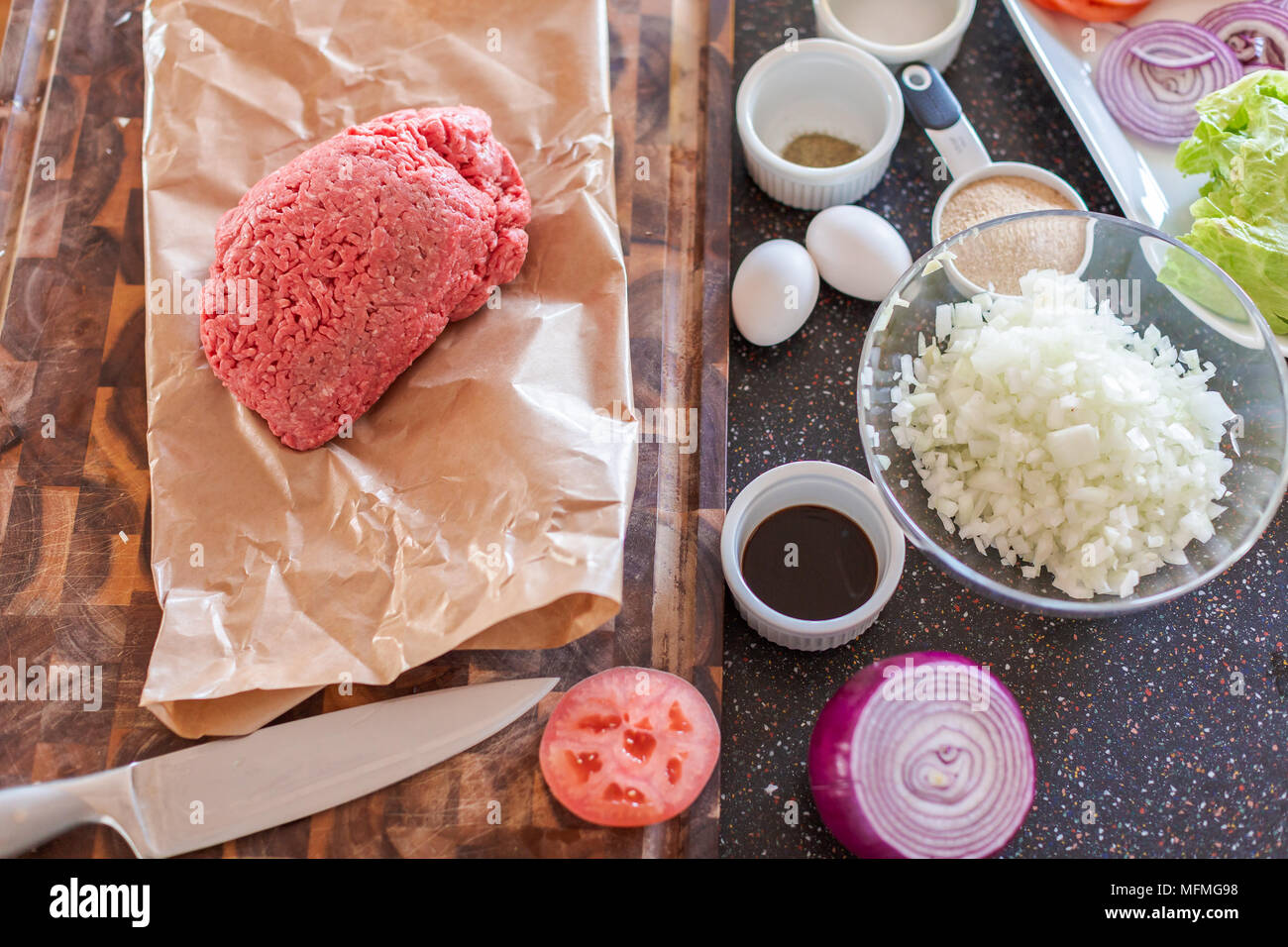 Preparing gourmet burger beef patties for classic burgers Stock Photo ...