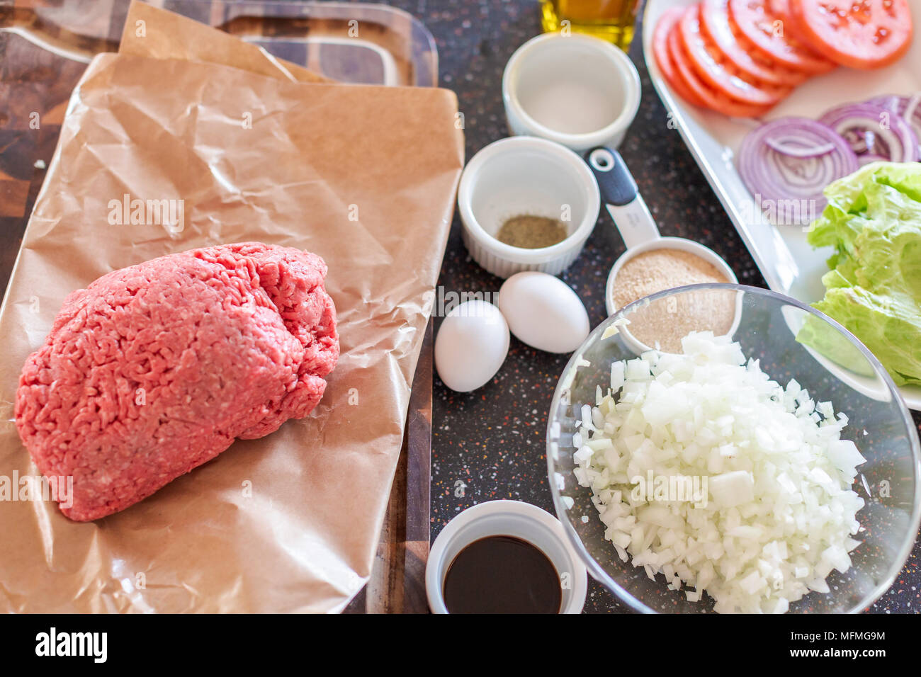 Preparing gourmet burger beef patties for classic burgers Stock Photo ...