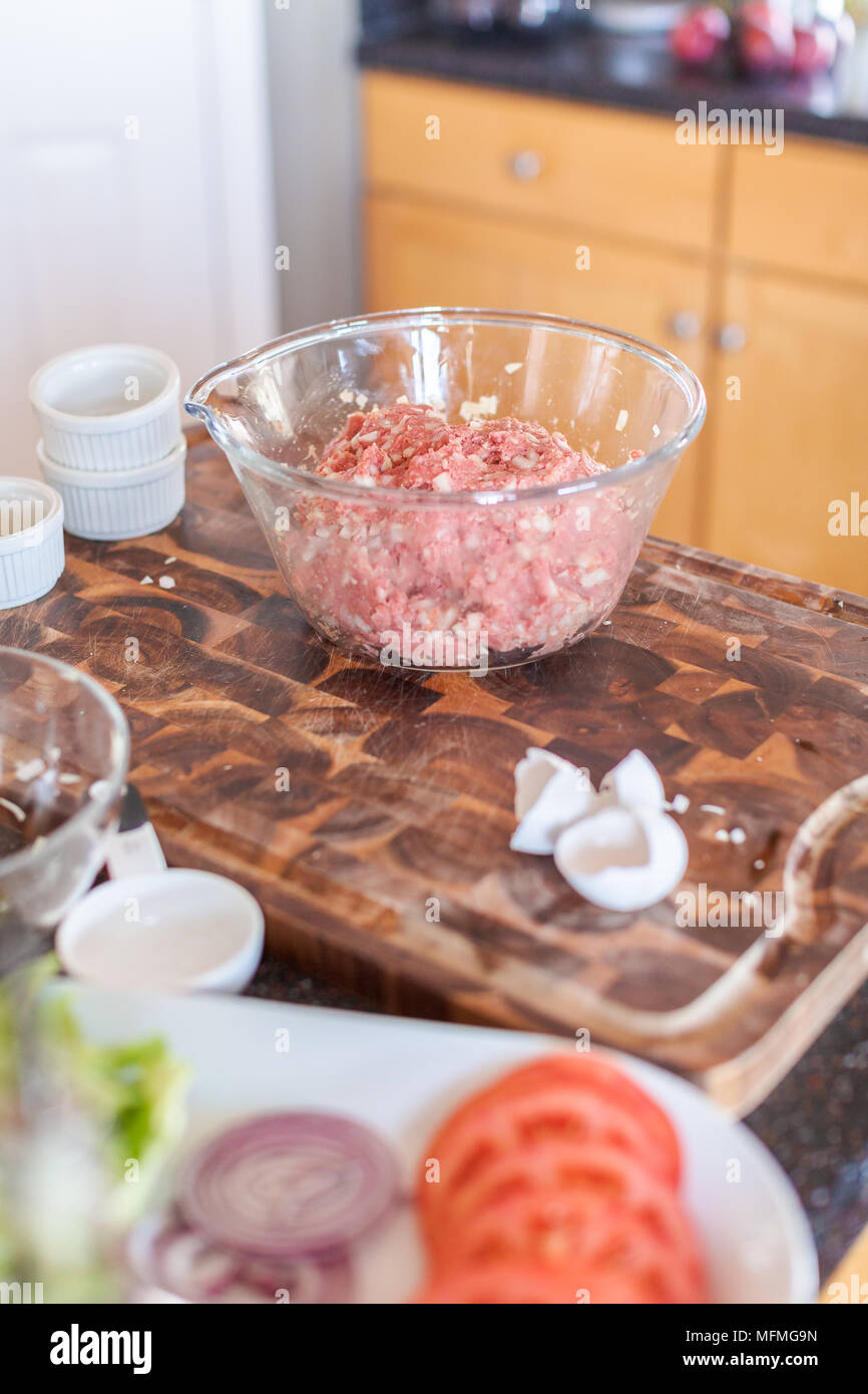 Preparing gourmet burger beef patties for classic burgers Stock Photo ...