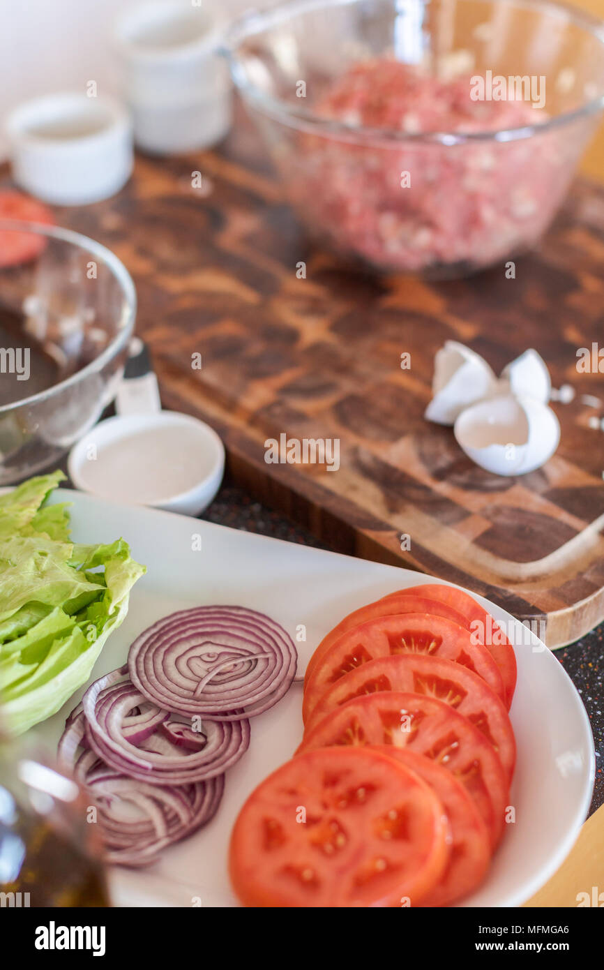 Preparing gourmet burger beef patties for classic burgers Stock Photo ...