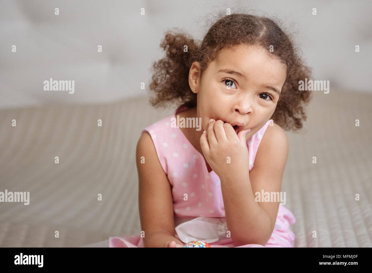Beautiful young afro little girl infront Stock Photo - Alamy