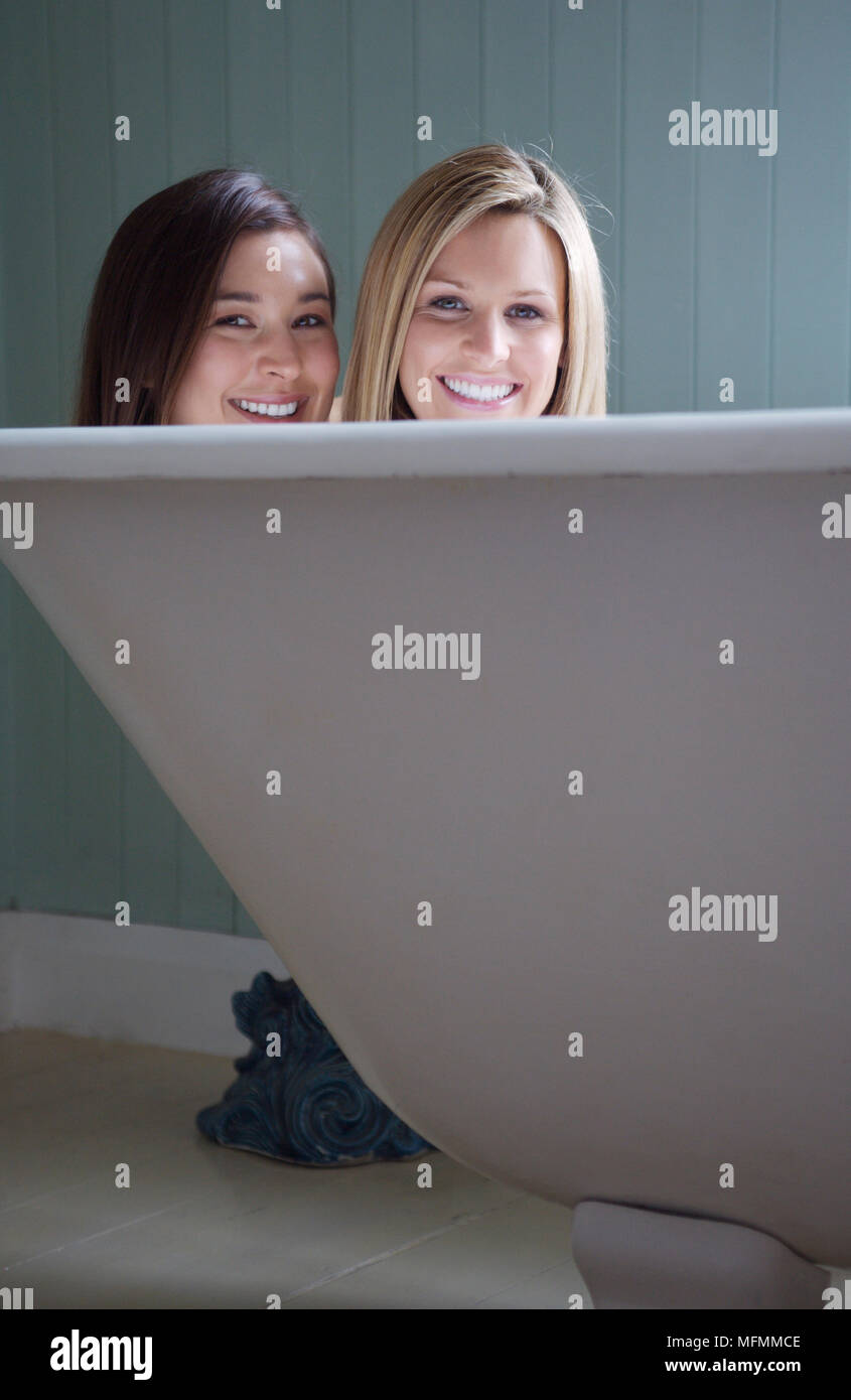 Two women in bathtub hi-res stock photography and images - Alamy