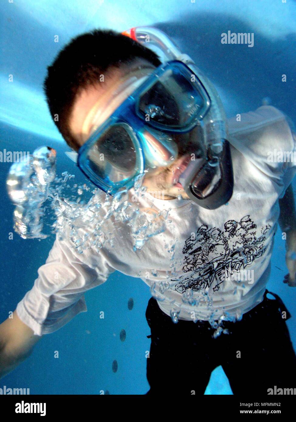 Close-up of a young man snorkeling underwater Ref: CRB416 10009 030 ...