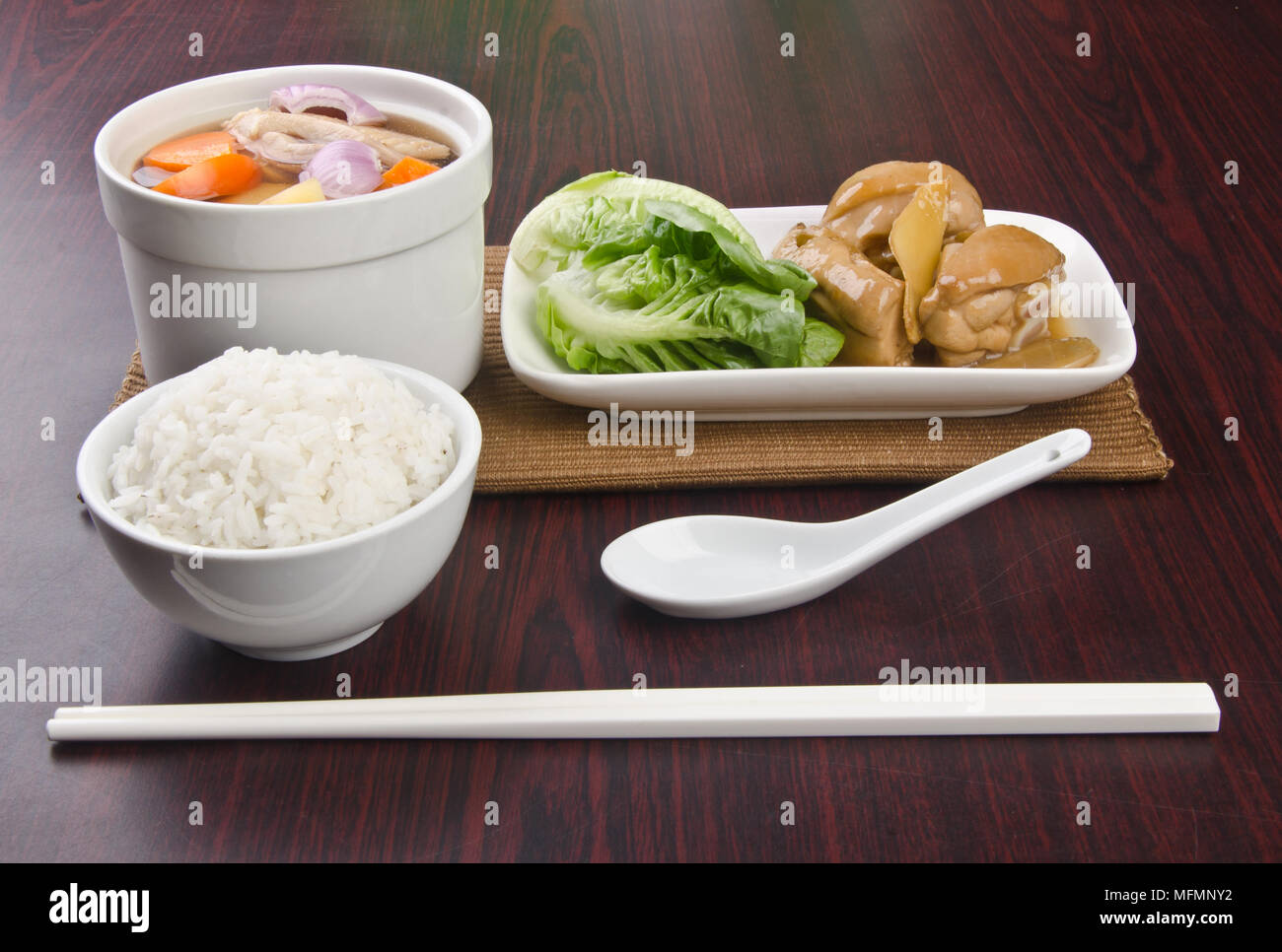 Chicken and herb soup in pot, Chinese food style Stock Photo - Alamy