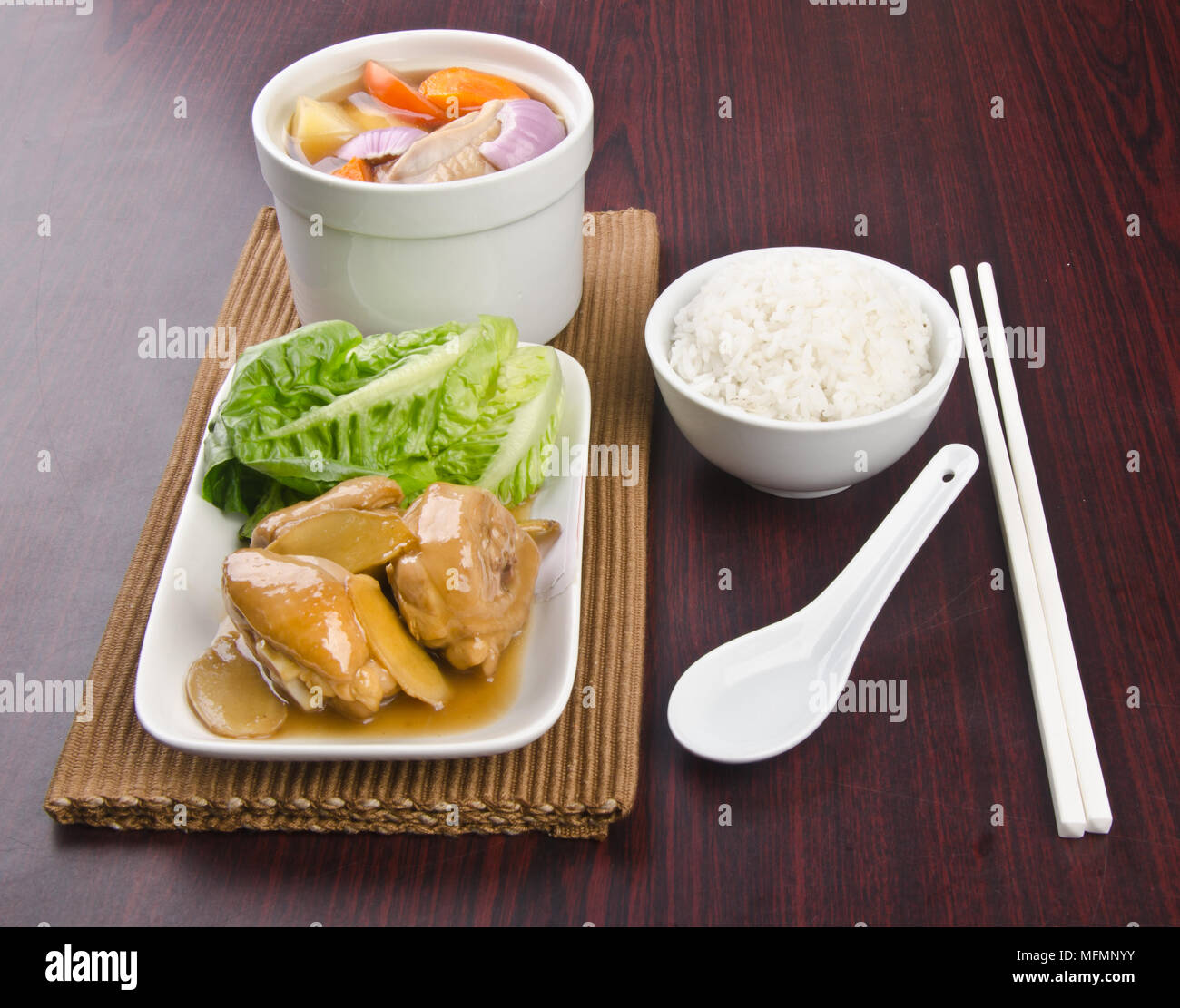 Chicken and herb soup in pot, Chinese food style Stock Photo - Alamy