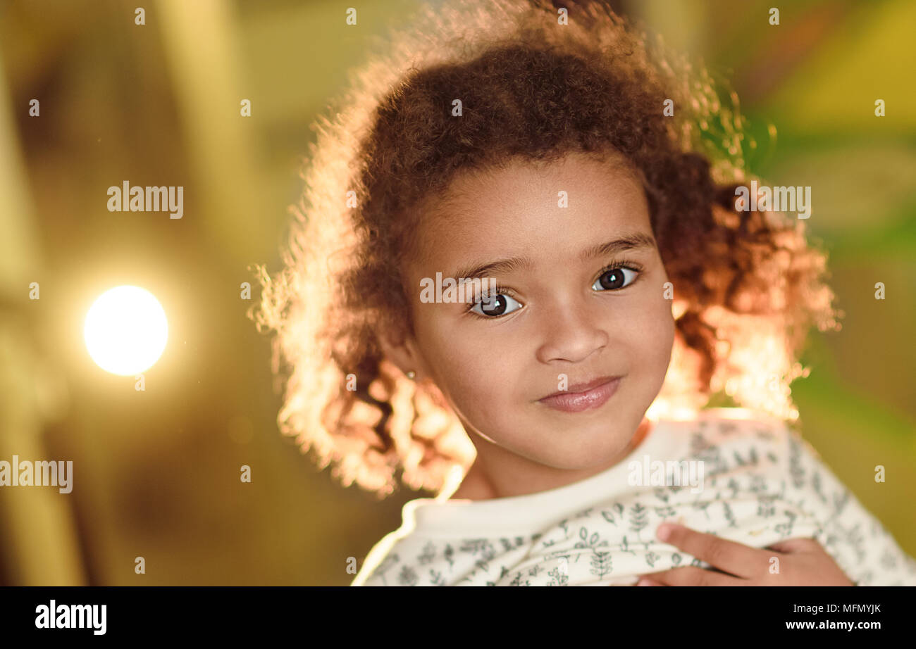 Beautiful young afro little girl infront Stock Photo - Alamy