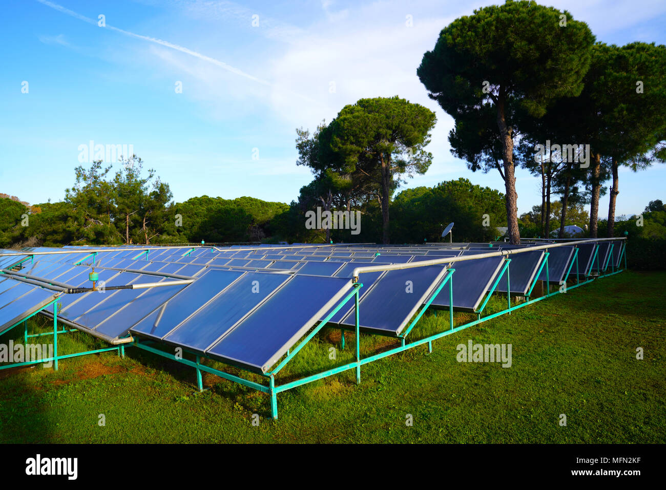 Photovoltaic power station or solar farm among trees in Antalya, Turkey ...