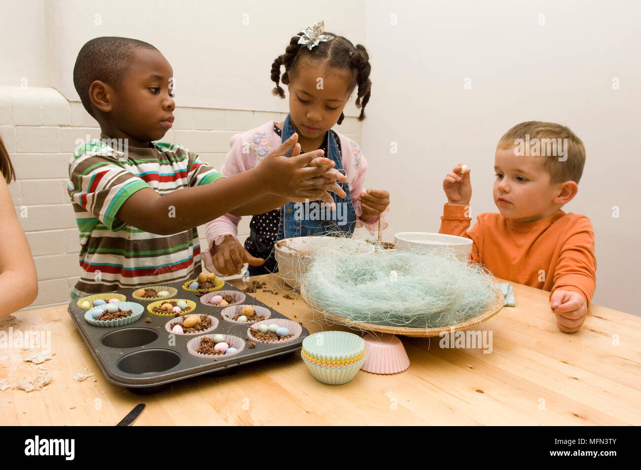 Child baking cakes messy hi-res stock photography and images - Alamy