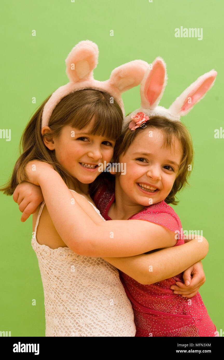 Close up two girls hugging other hi-res stock photography and images ...