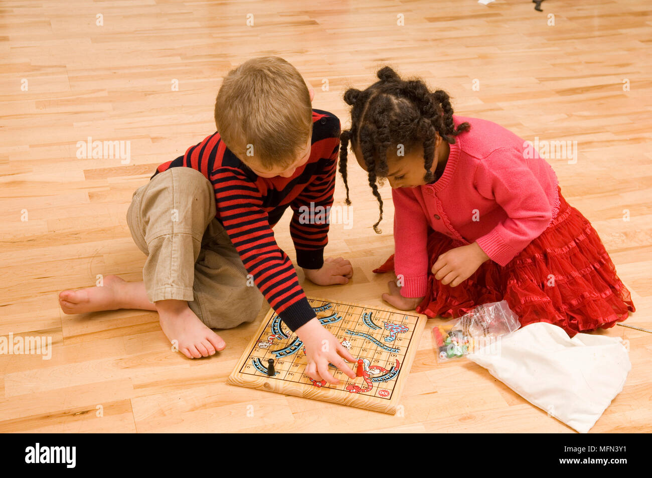 Children snakes and ladders hi-res stock photography and images - Alamy