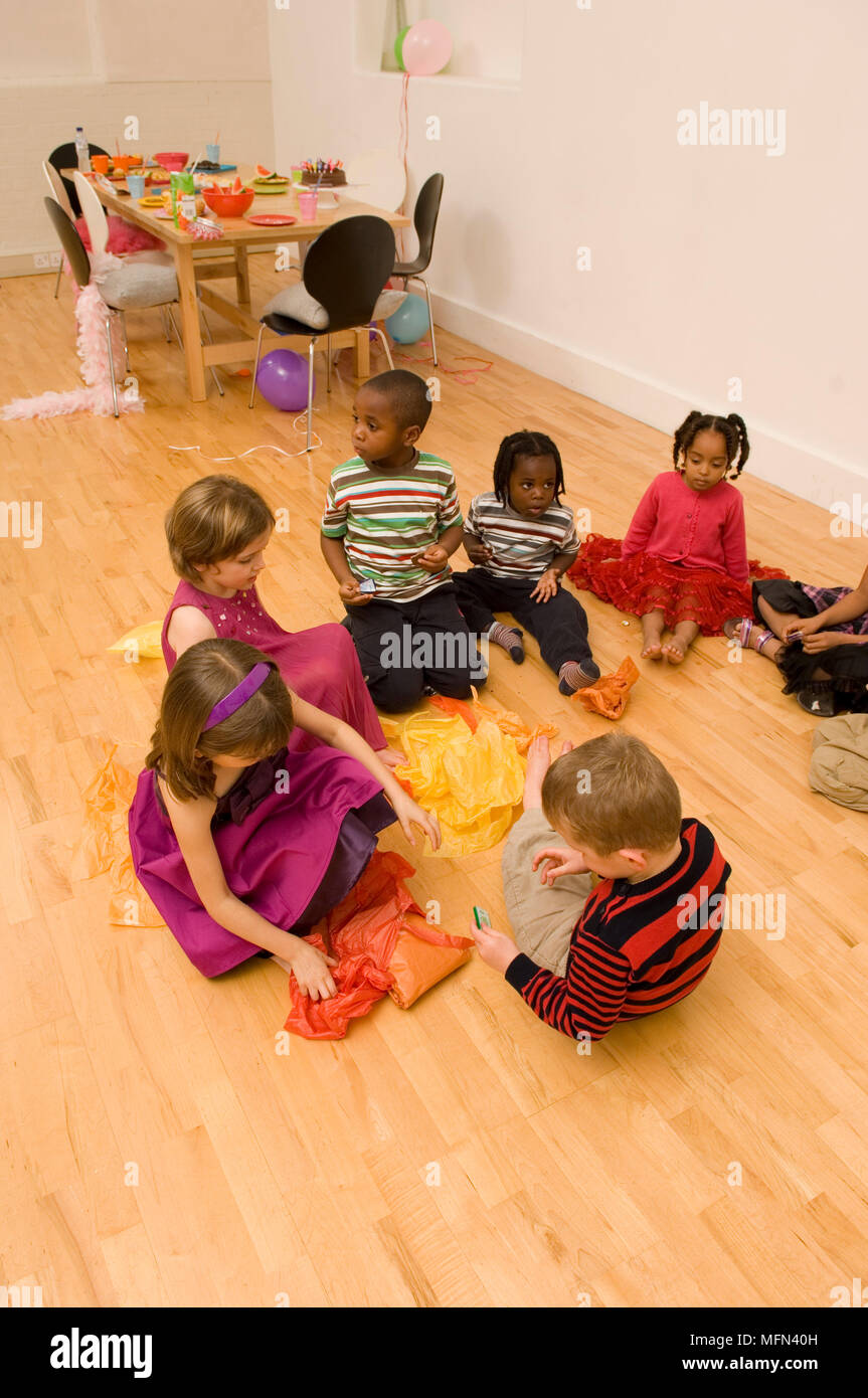 Group of children playing pass the parcel Ref: Compulsory Credit Stock ...