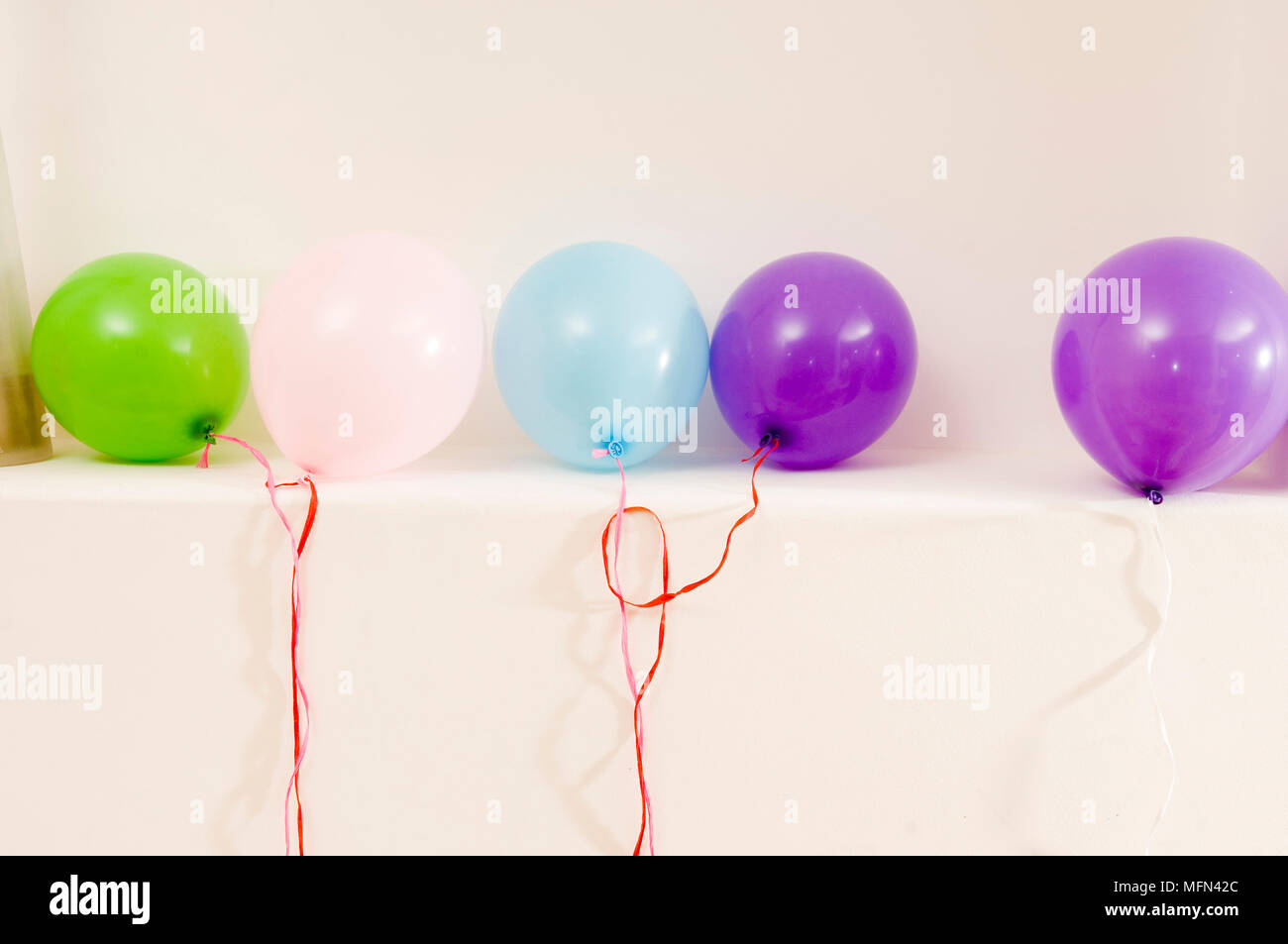 Balloons in a row hi-res stock photography and images - Alamy