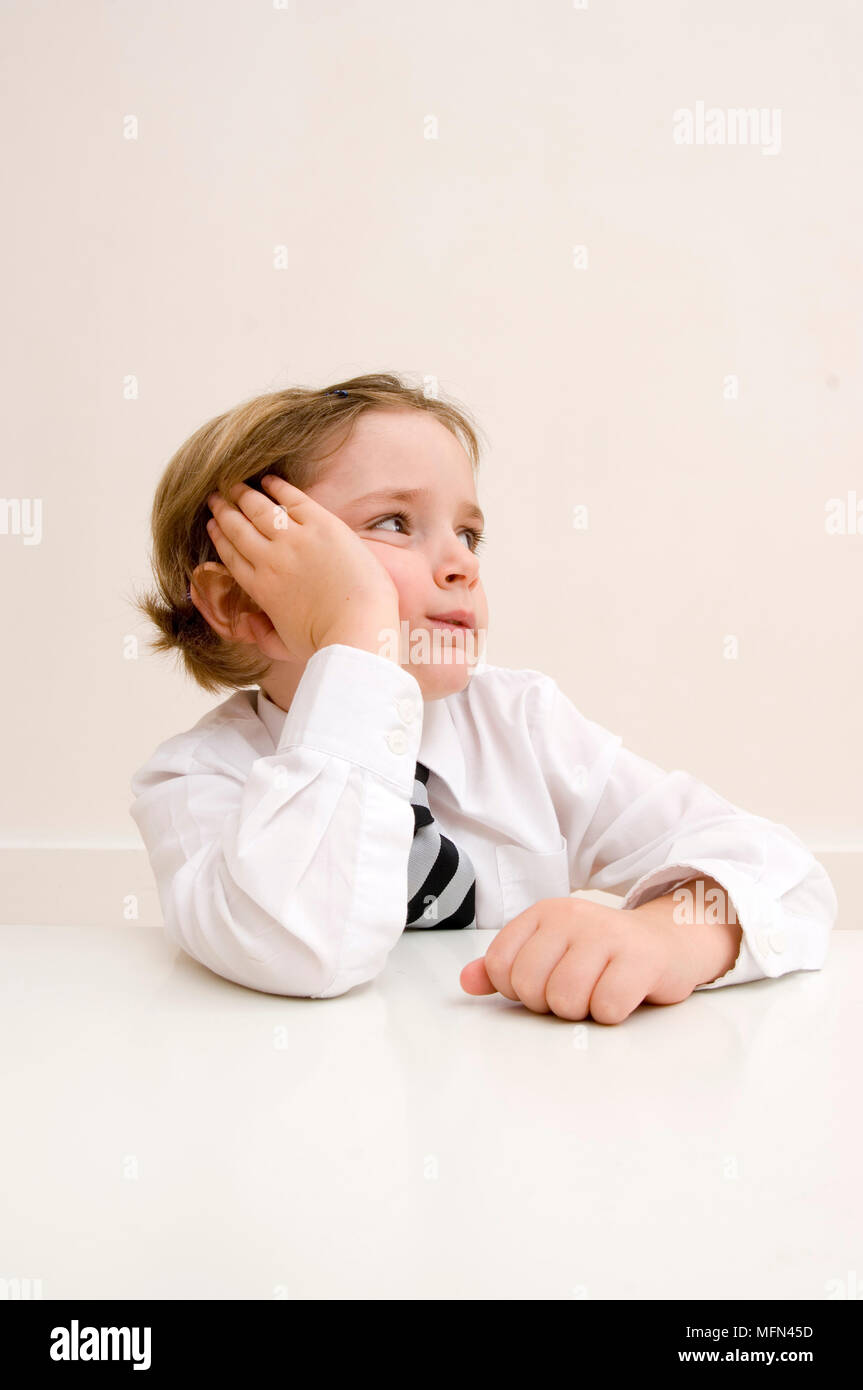 Close-up of a girl thinking Ref: Compulsory Credit Stock Photo - Alamy
