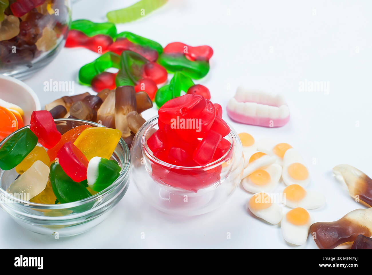 Tasty Mixed colorful sweets jelly Different sorts candy on white ...