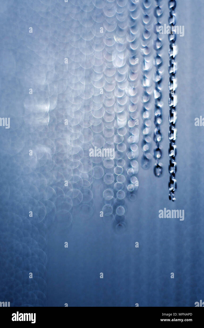 Hanging Metal Chains High Resolution Stock Photography and Images - Alamy