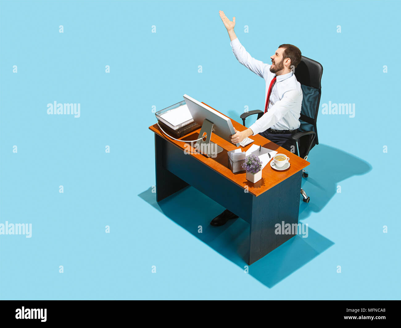Shot from above of a stylish business man working on a laptop Stock ...