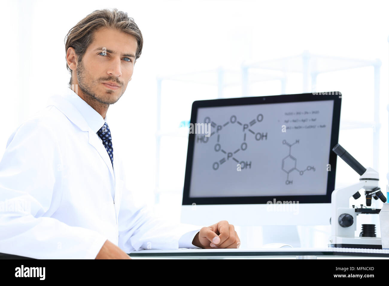 Medical doctor working with microscope in laboratory Stock Photo - Alamy