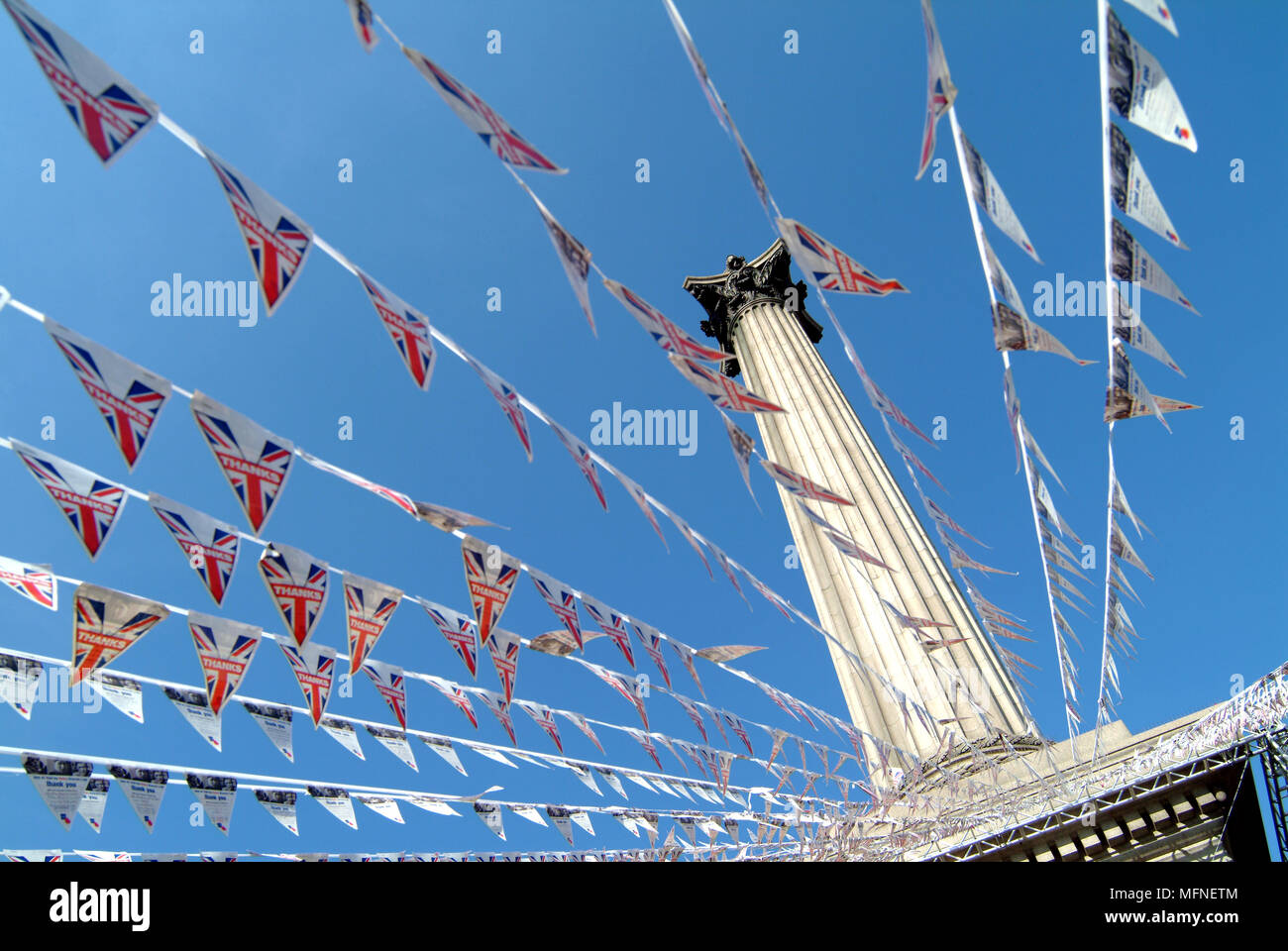 Low angle view of buntings tied to the base of a column Ref: CRB247 ...