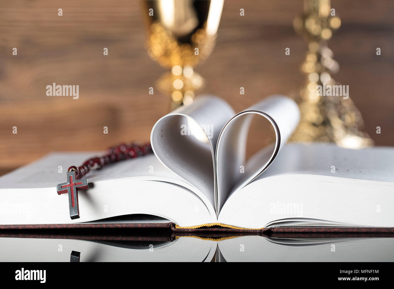 First holy communion theme. The Cross, Holy Bible, rosary and golden ...