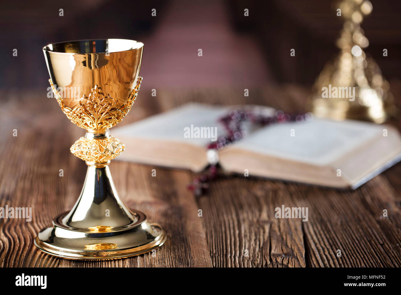 First holy communion theme. The Cross, Holy Bible, rosary and golden ...