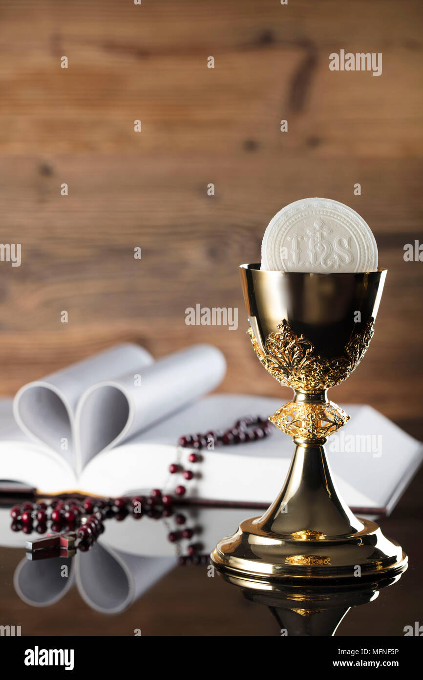 First holy communion theme. The Cross, Holy Bible, rosary and golden ...