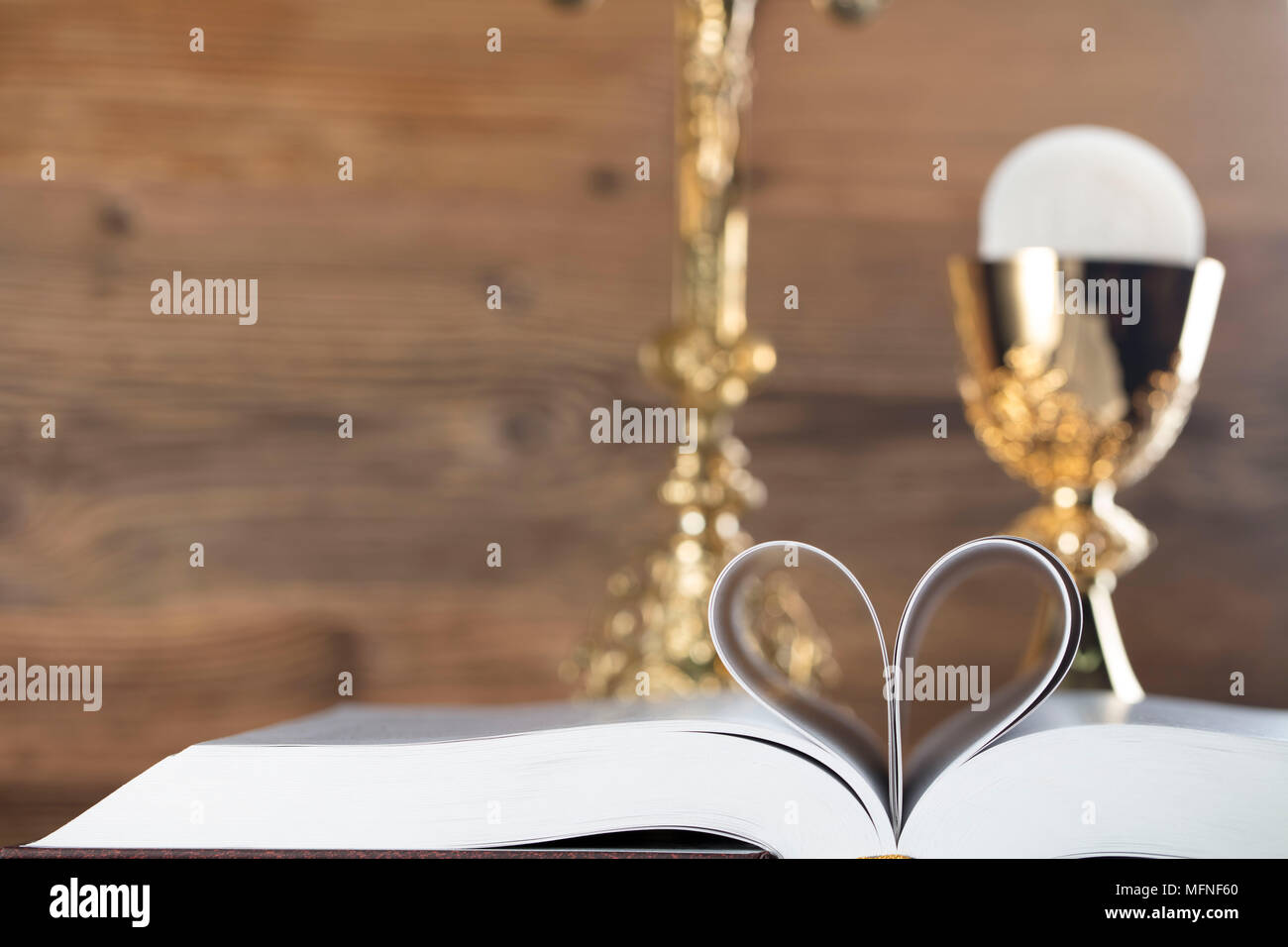 First holy communion theme. The Cross, Holy Bible, rosary and golden ...