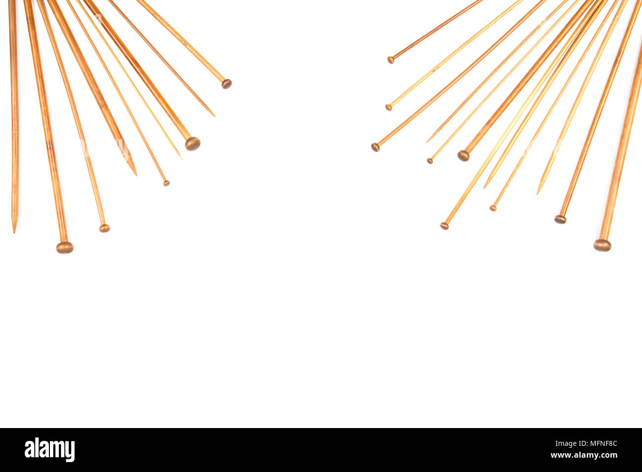 Wooden knitting needles frame on white background Stock Photo - Alamy