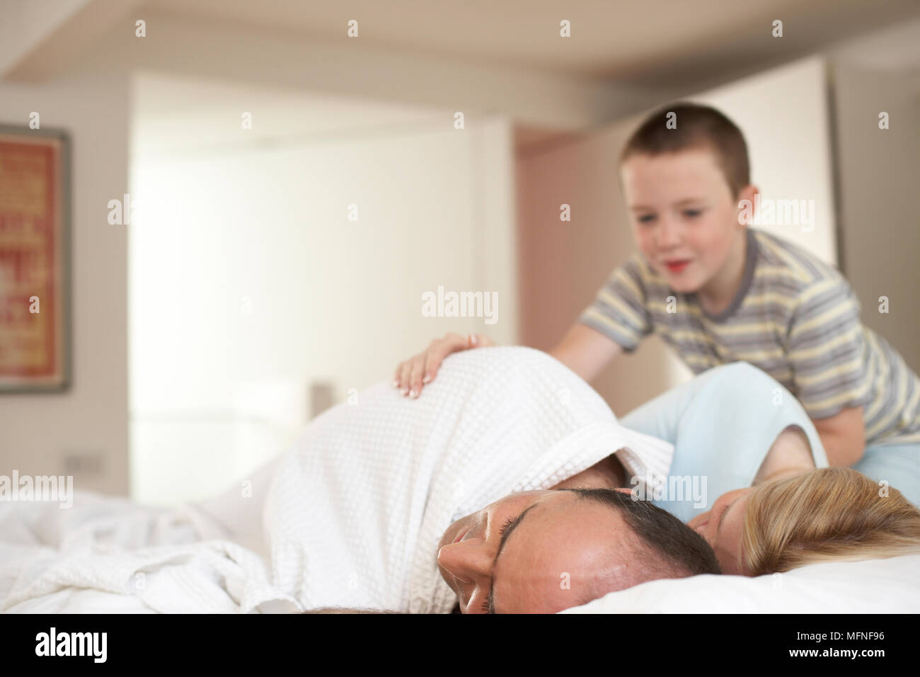 Father waking up son hi-res stock photography and images - Alamy