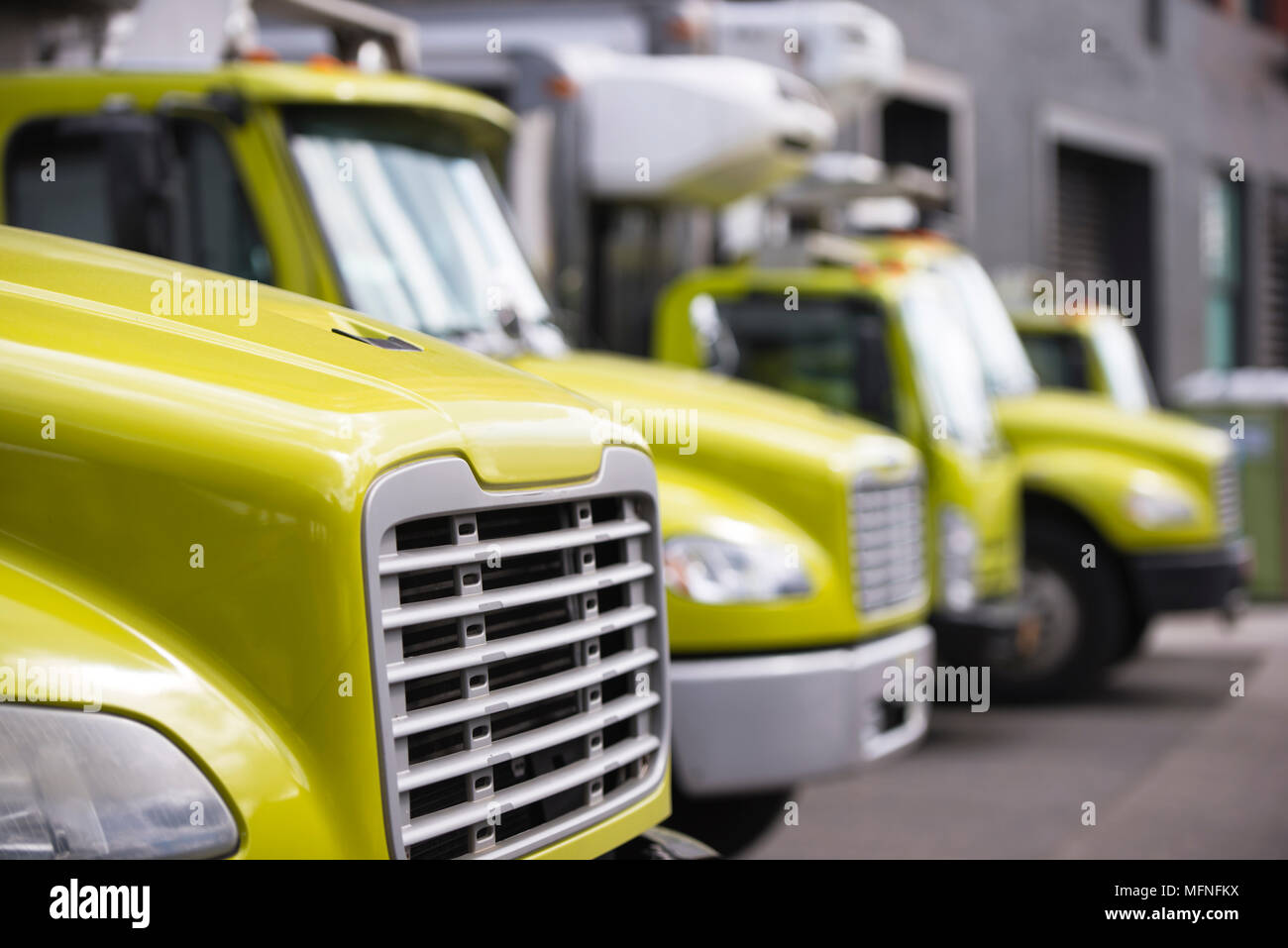 Middle class yellow semi trucks different makes and models with ...