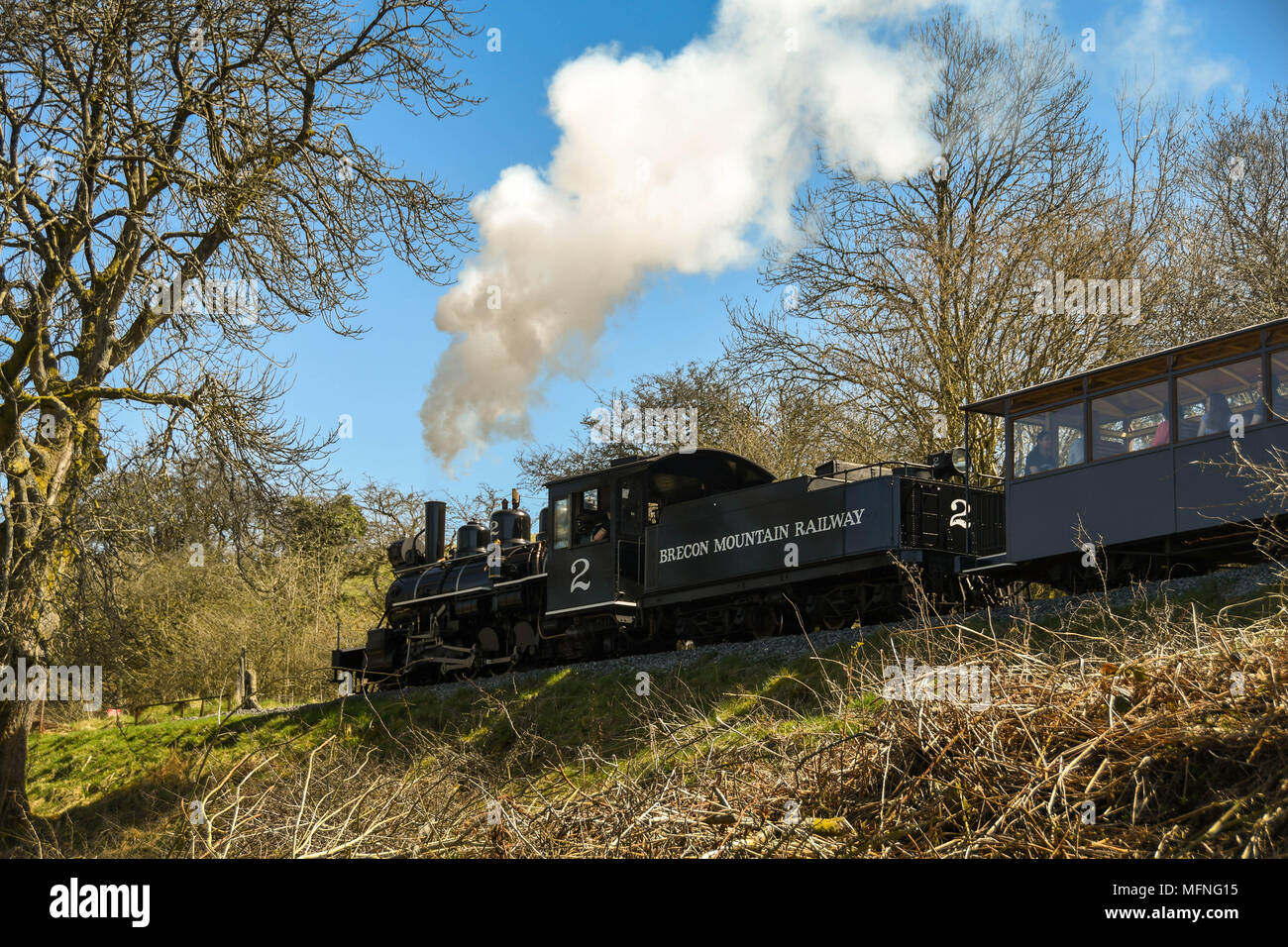 Scenic view of a steam engine pulling coaches on the Brecon Mountain ...
