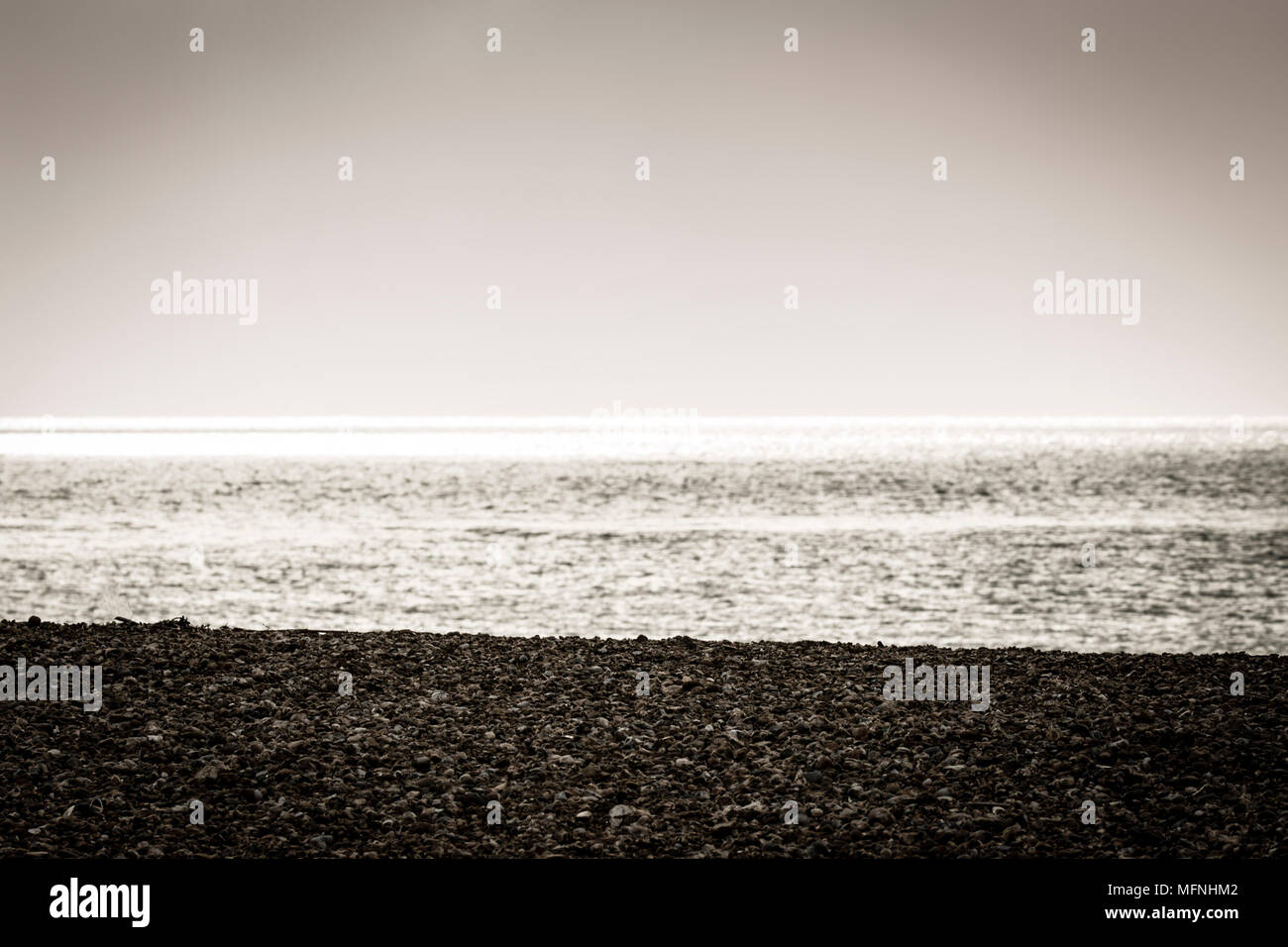 Shingle beach and sea Stock Photo - Alamy