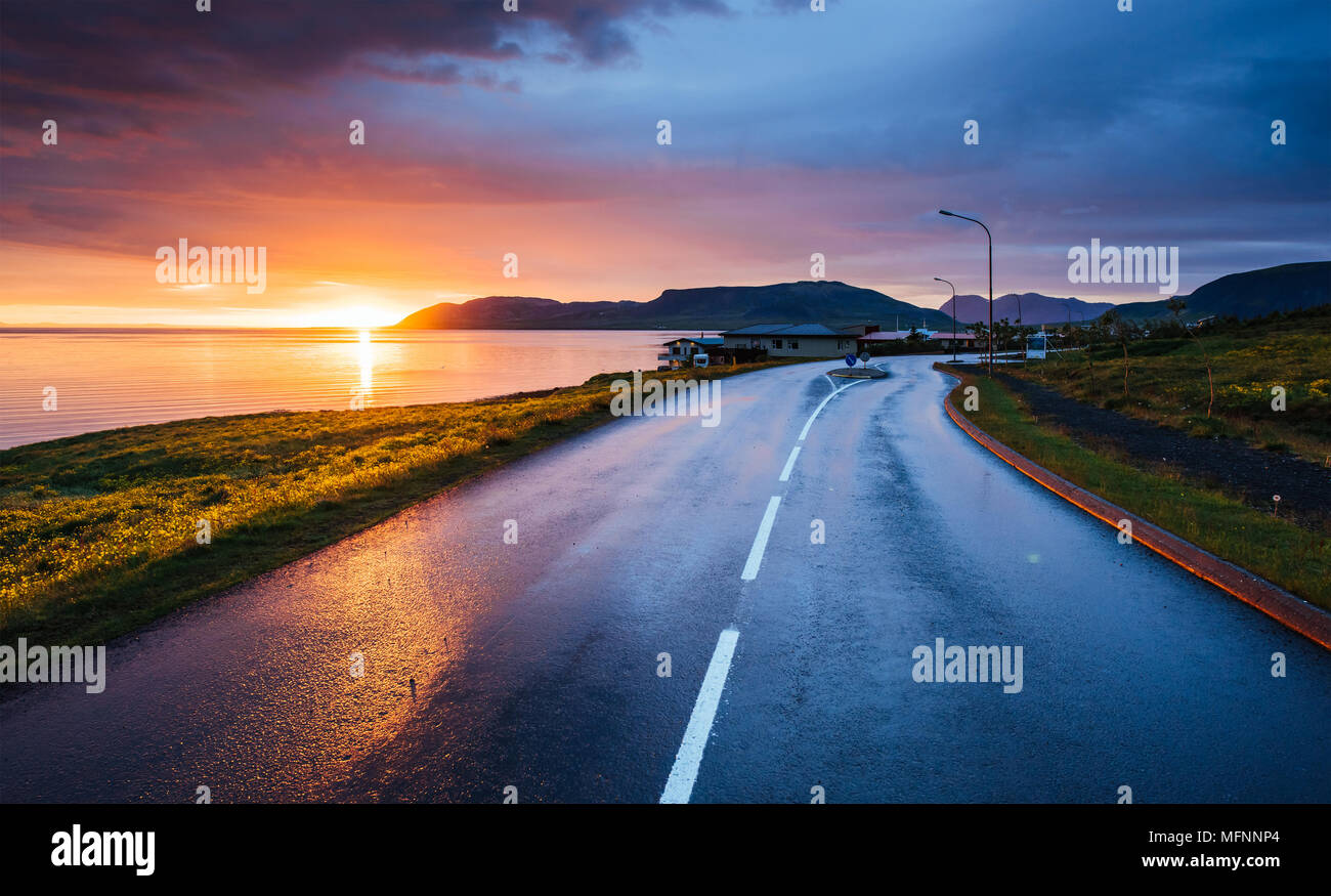 Lake sunrise and Beautiful road view Stock Photo - Alamy