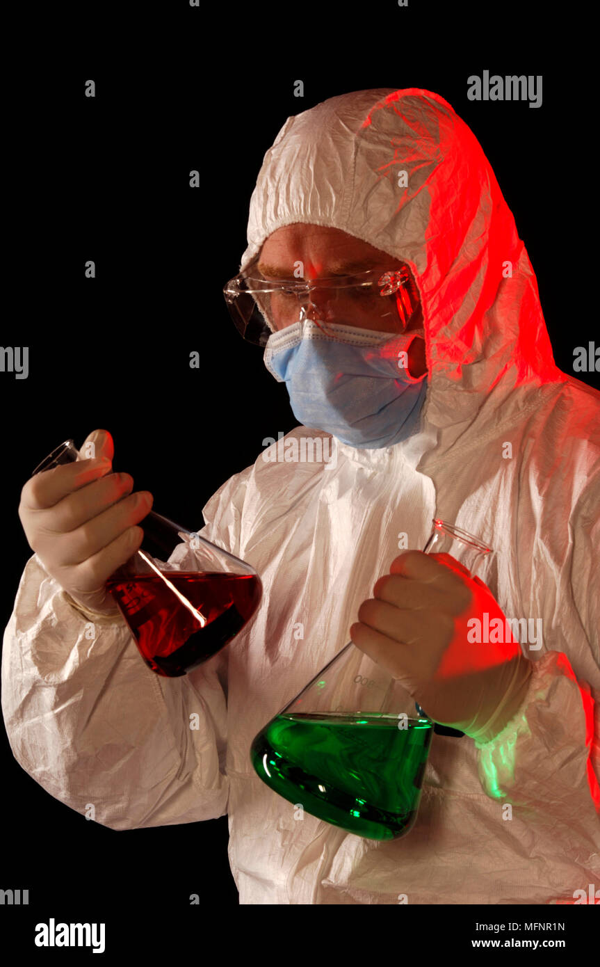 Technician mixing two chemical substances liquid hi-res stock ...