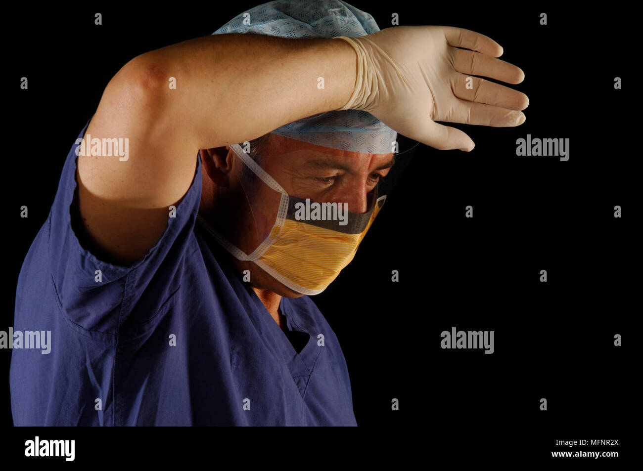 Stressed surgeon Ref: CRB425 10046 037 Compulsory Credit: Synercomm ...