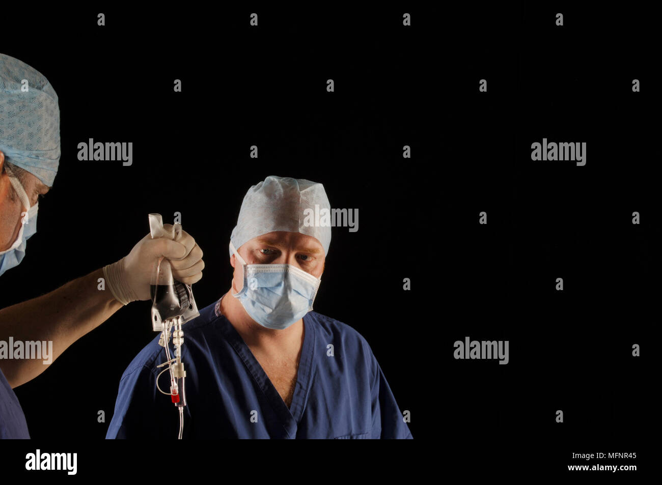 Nhs staff in a hospital theatre hi-res stock photography and images - Alamy