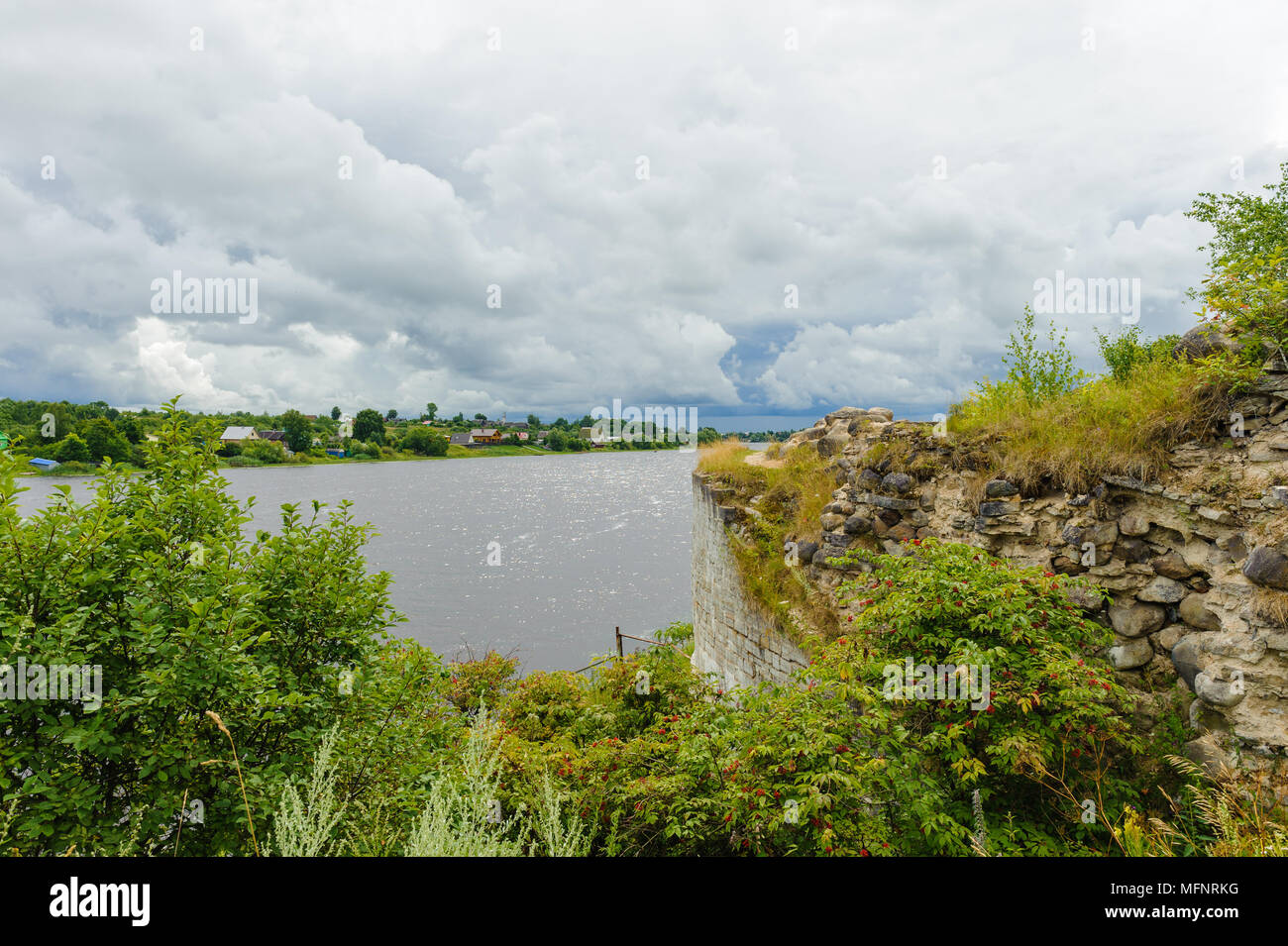 Small houses on the opposite side of the river Stock Photo - Alamy