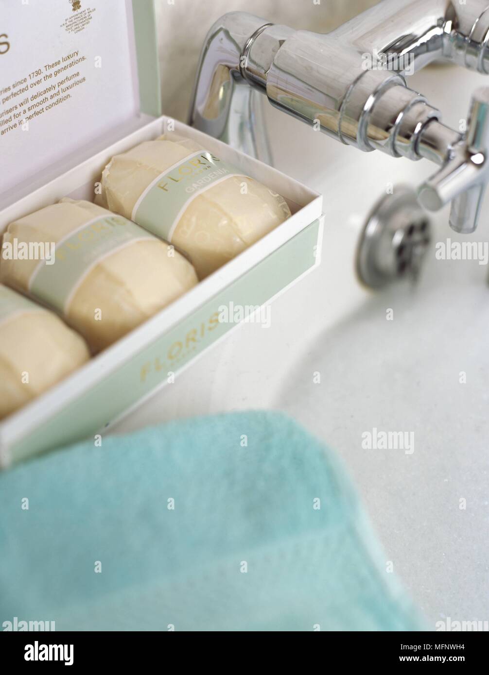 Soap and a face flannel at the edge of a bathtub Ref: CRB499 103524 ...