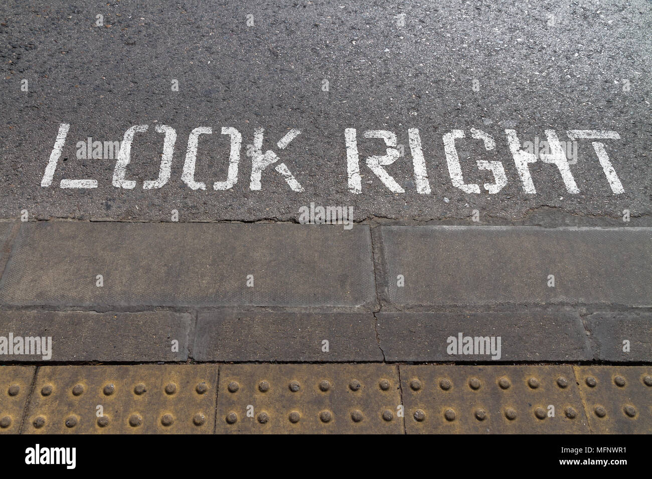 Pedestrian crossing look left sign hi-res stock photography and images ...