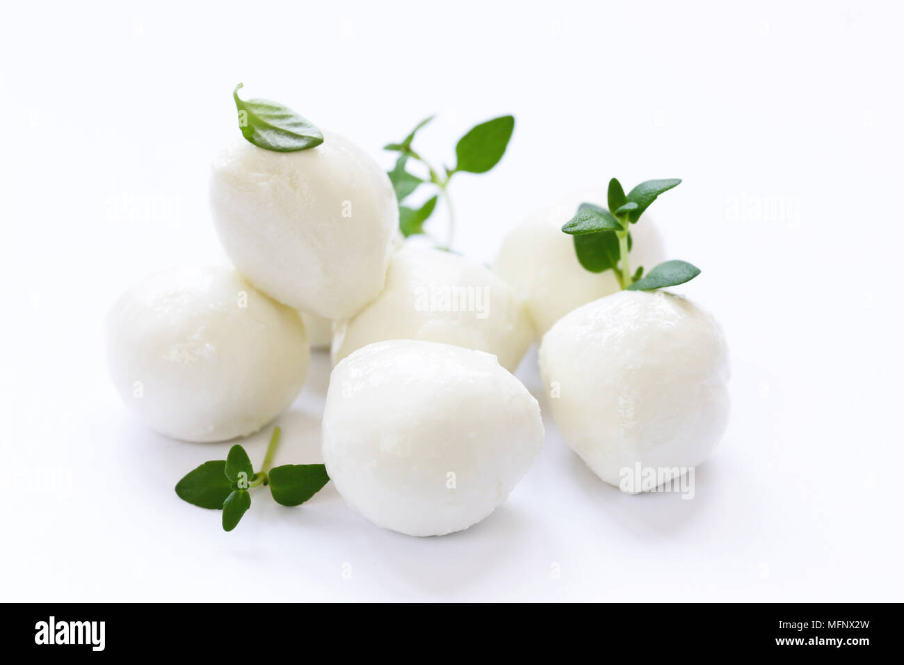 fresh natural mozzarella cheese with thyme leaves Stock Photo - Alamy