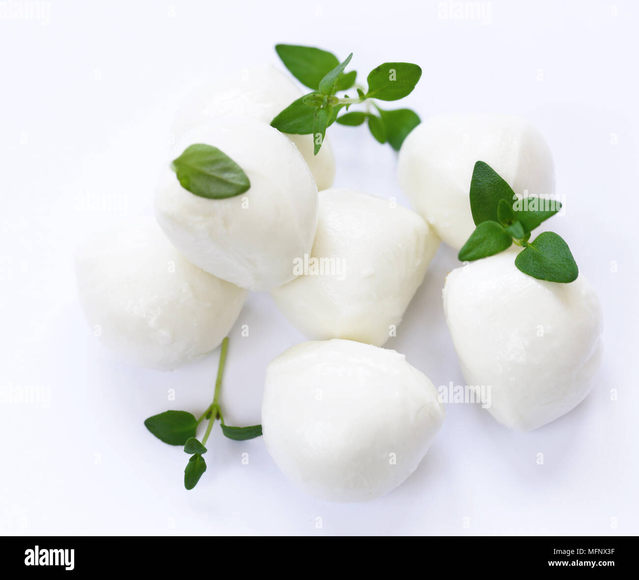 fresh natural mozzarella cheese with thyme leaves Stock Photo - Alamy