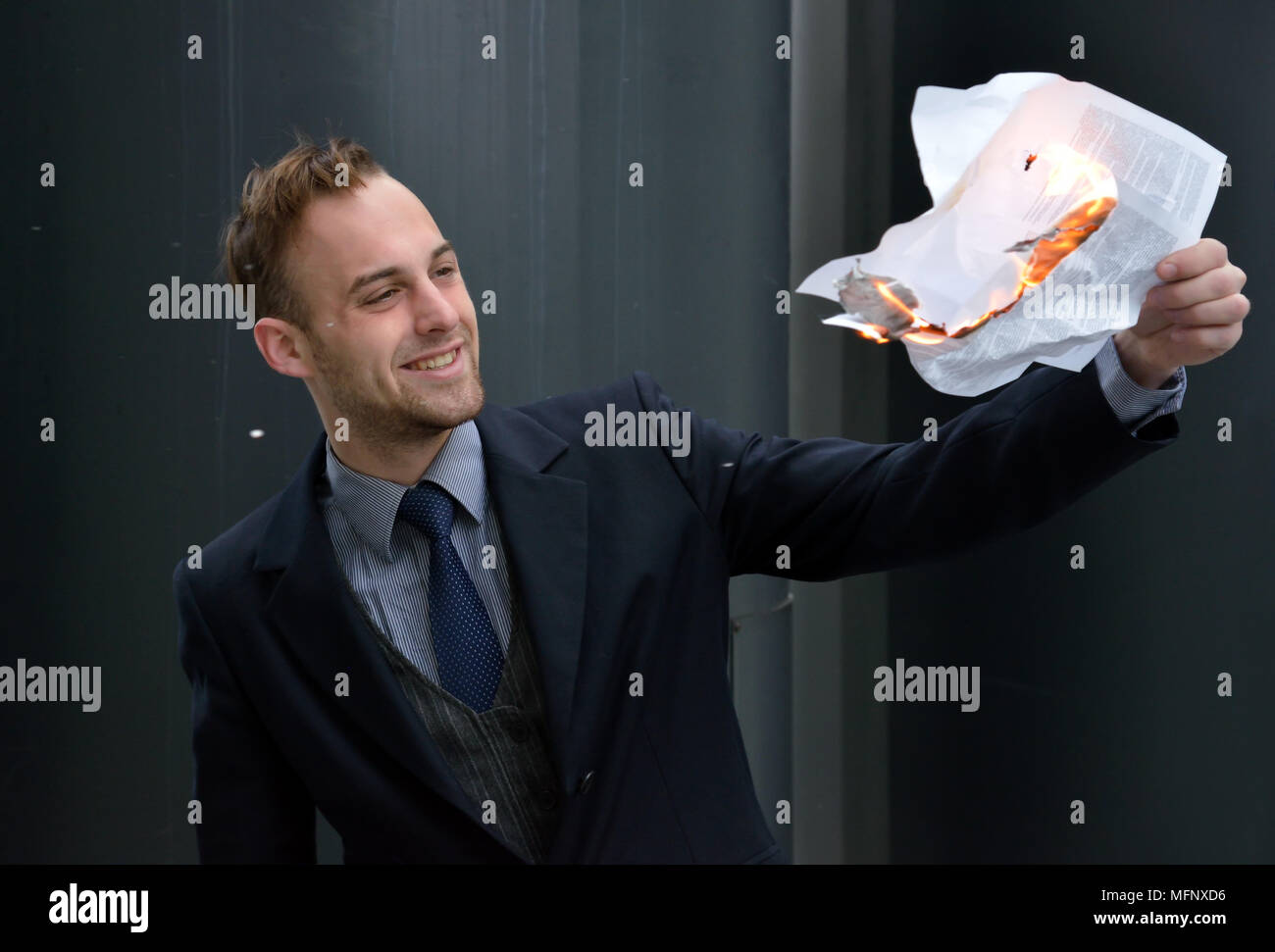Hand burn paper hi-res stock photography and images - Alamy