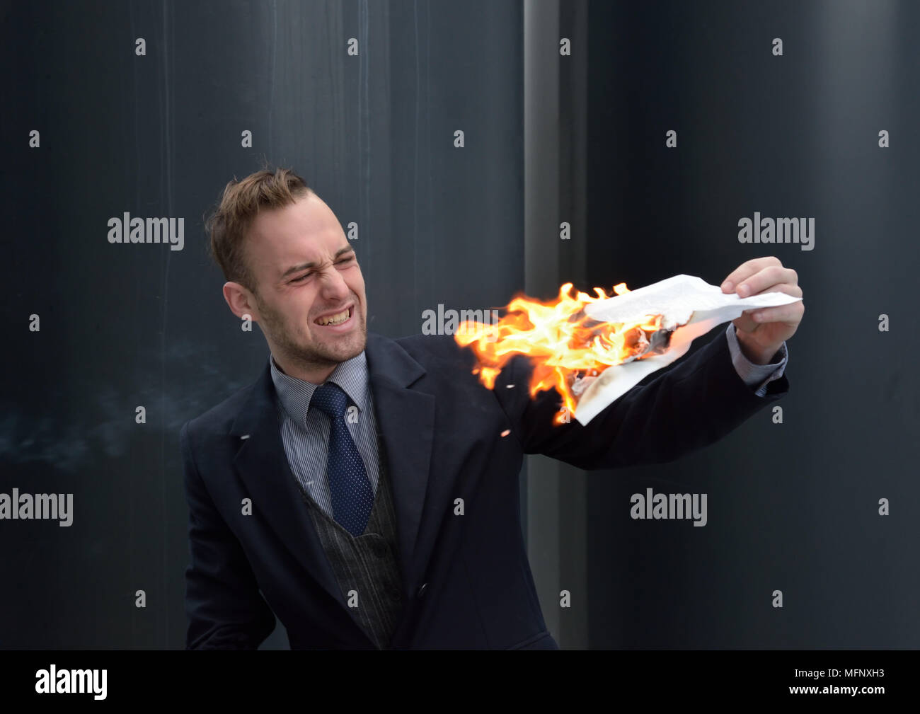 Hand burn paper hi-res stock photography and images - Alamy