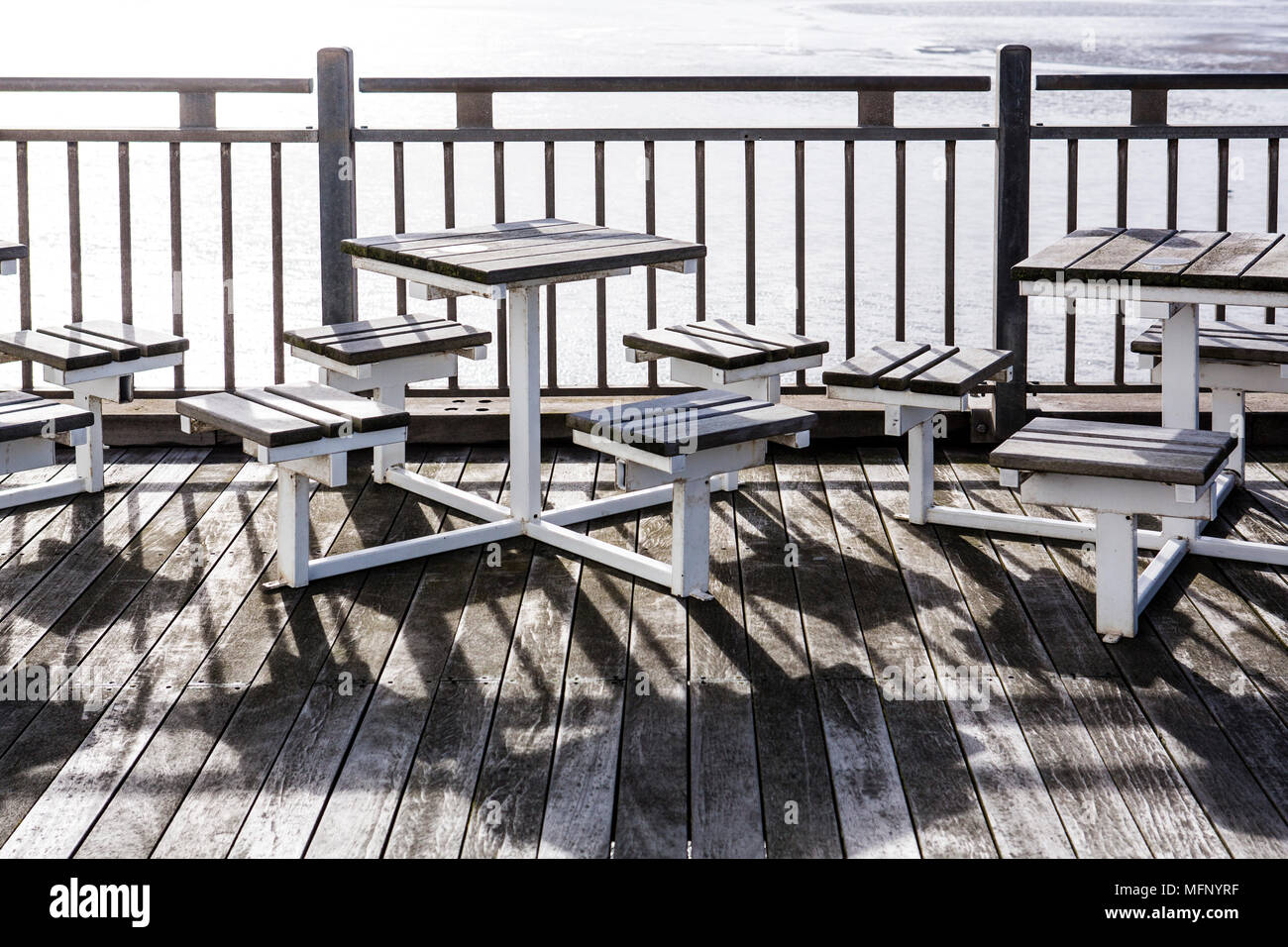 Tables and chairs on pier hi-res stock photography and images - Alamy