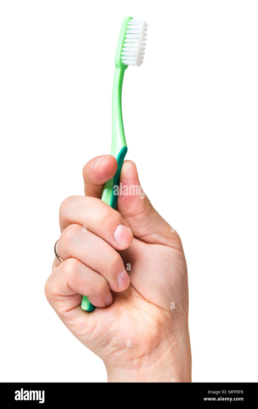 Hand with toothbrush on white Stock Photo - Alamy