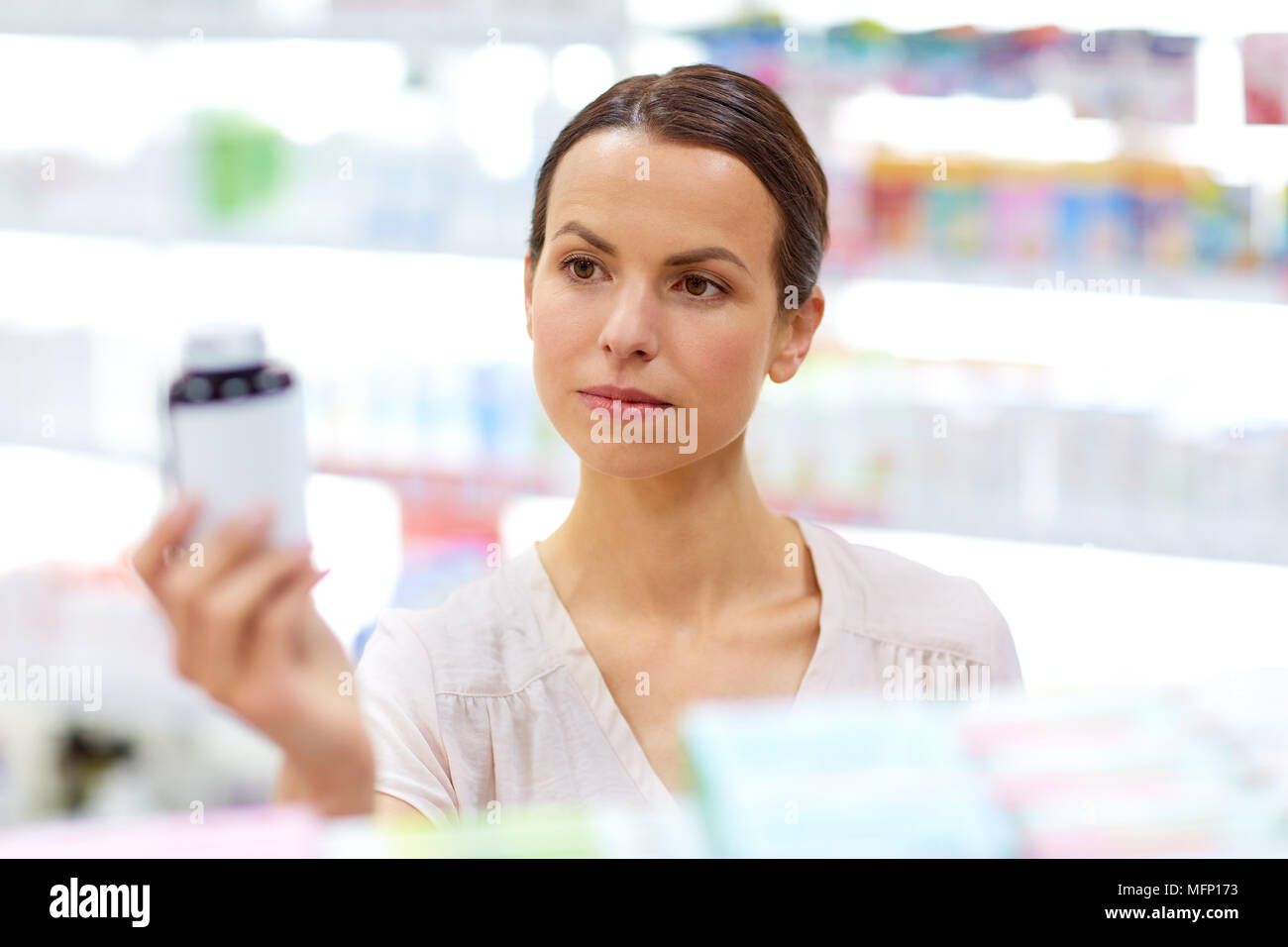 Female customer pharmacy hi-res stock photography and images - Alamy