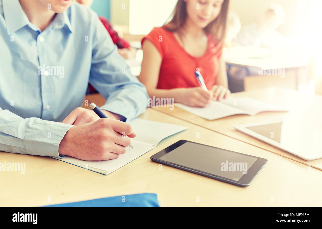 close up of students tablet pc writing at school Stock Photo - Alamy