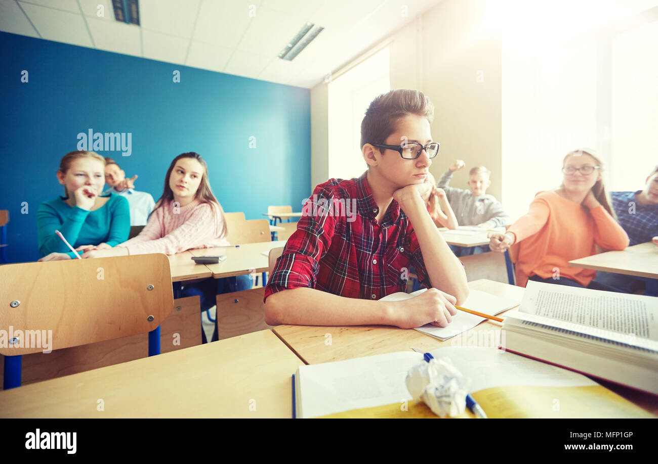 Sad child in school bullying hi-res stock photography and images - Alamy