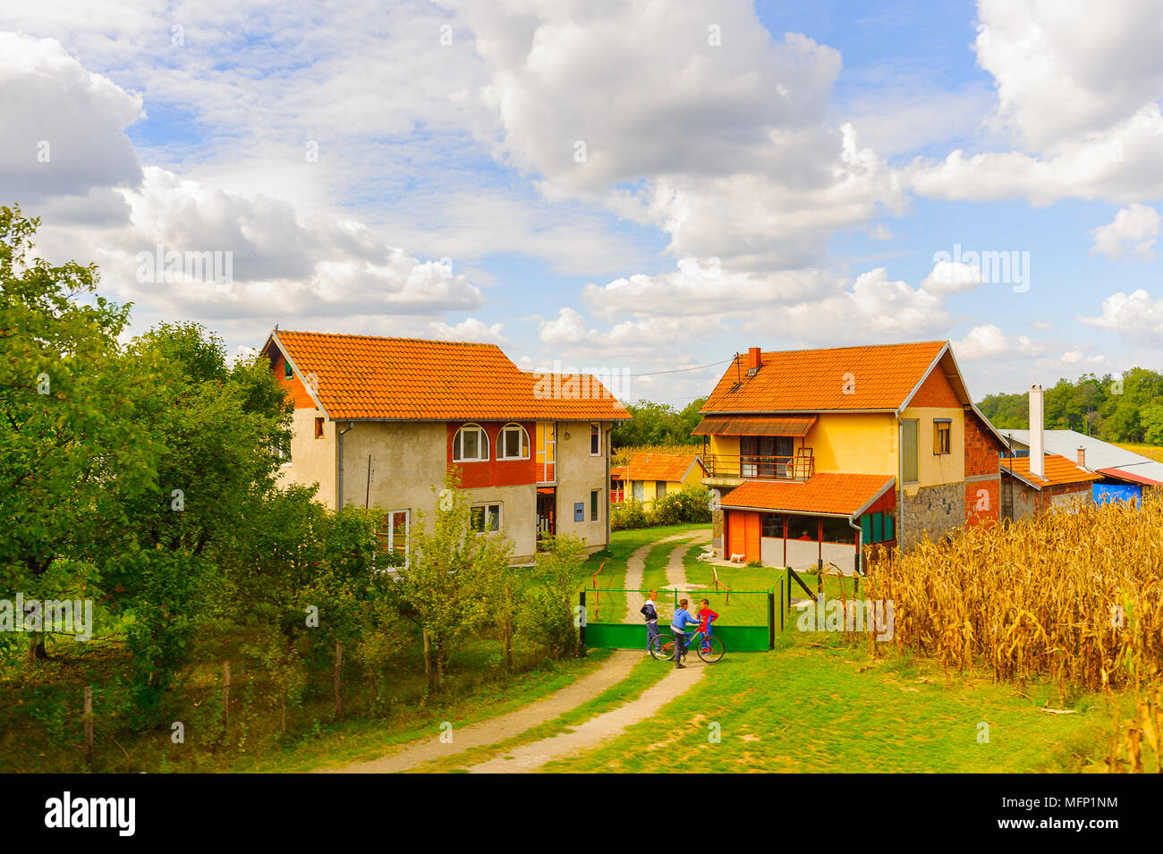 Farm houses a Serbian village Stock Photo - Alamy